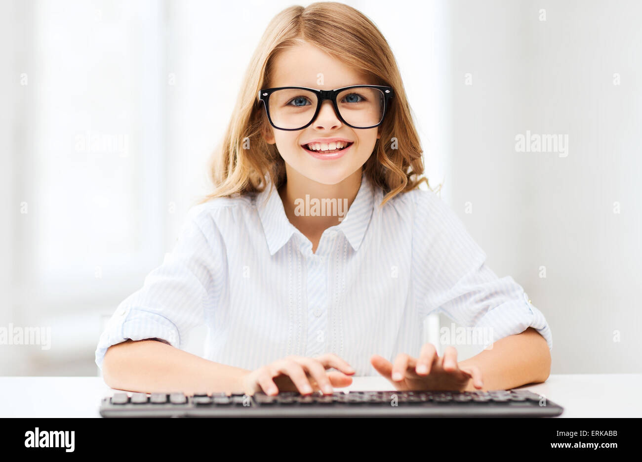 student girl with keyboard Stock Photo - Alamy