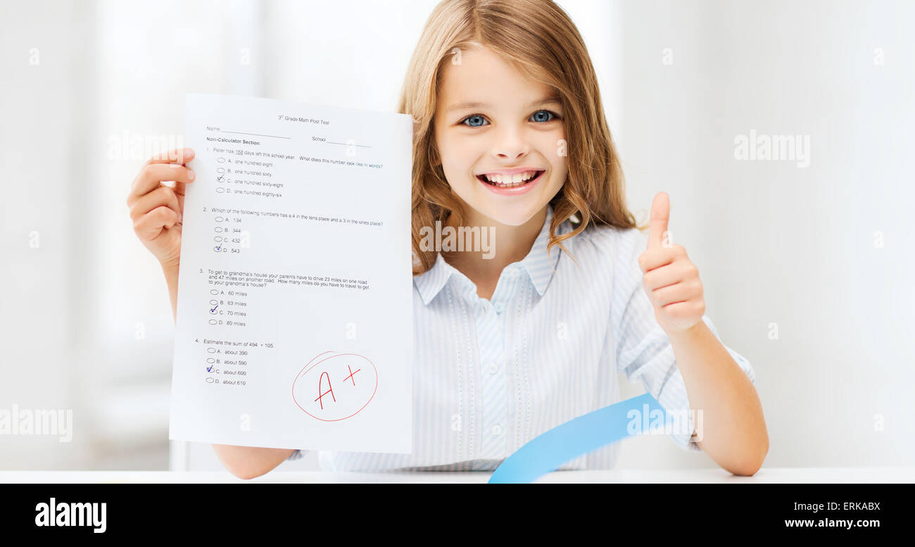 girl with test and grade at school Stock Photo - Alamy