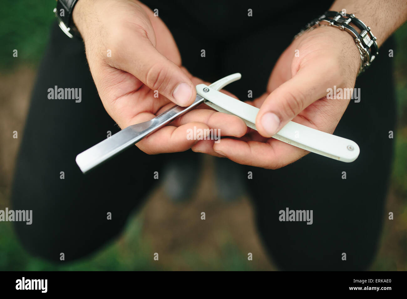 ancient blade in the hands of men Stock Photo - Alamy