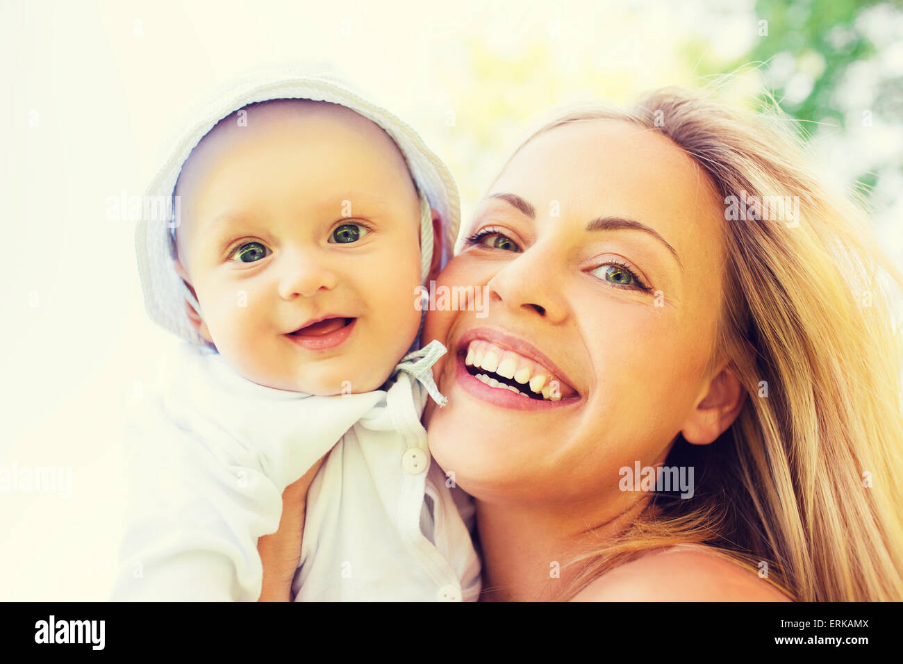 happy mother with little baby outdoors Stock Photo - Alamy