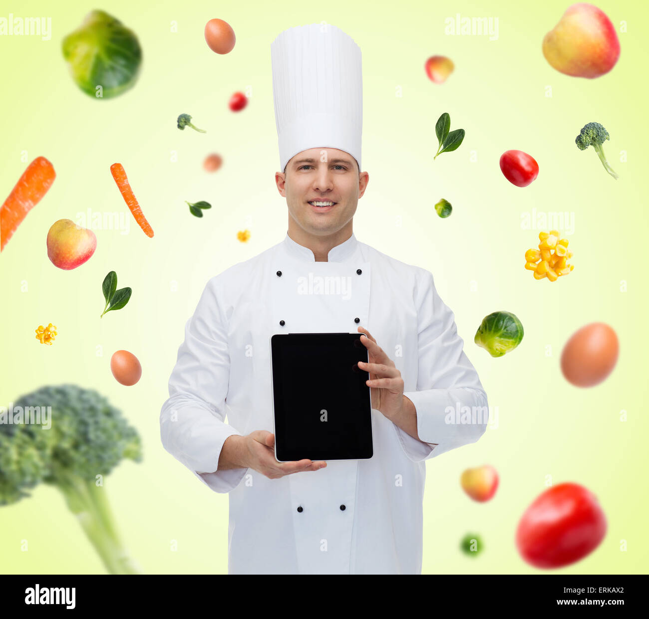 happy male chef cook showing with tablet pc Stock Photo - Alamy