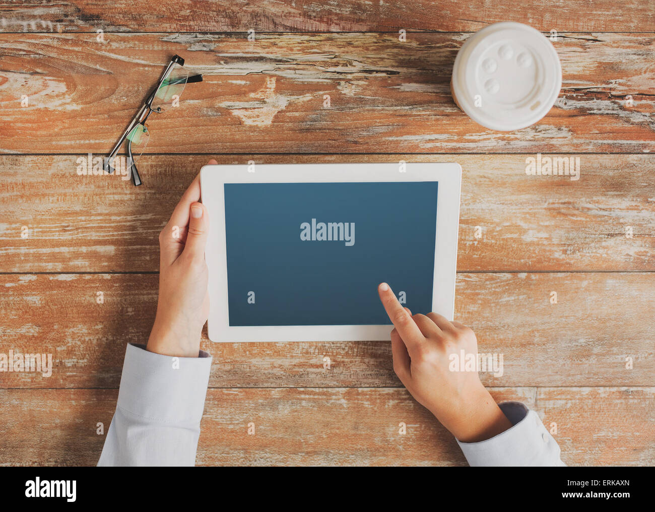 close up of hands with tablet pc and coffee Stock Photo - Alamy