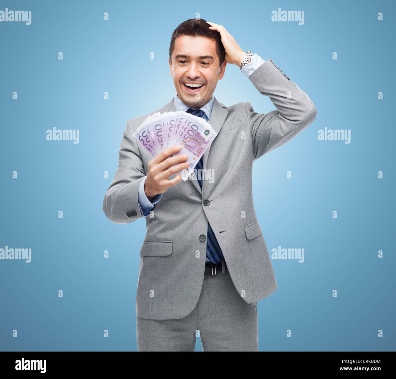 happy laughing businessman with euro money Stock Photo - Alamy