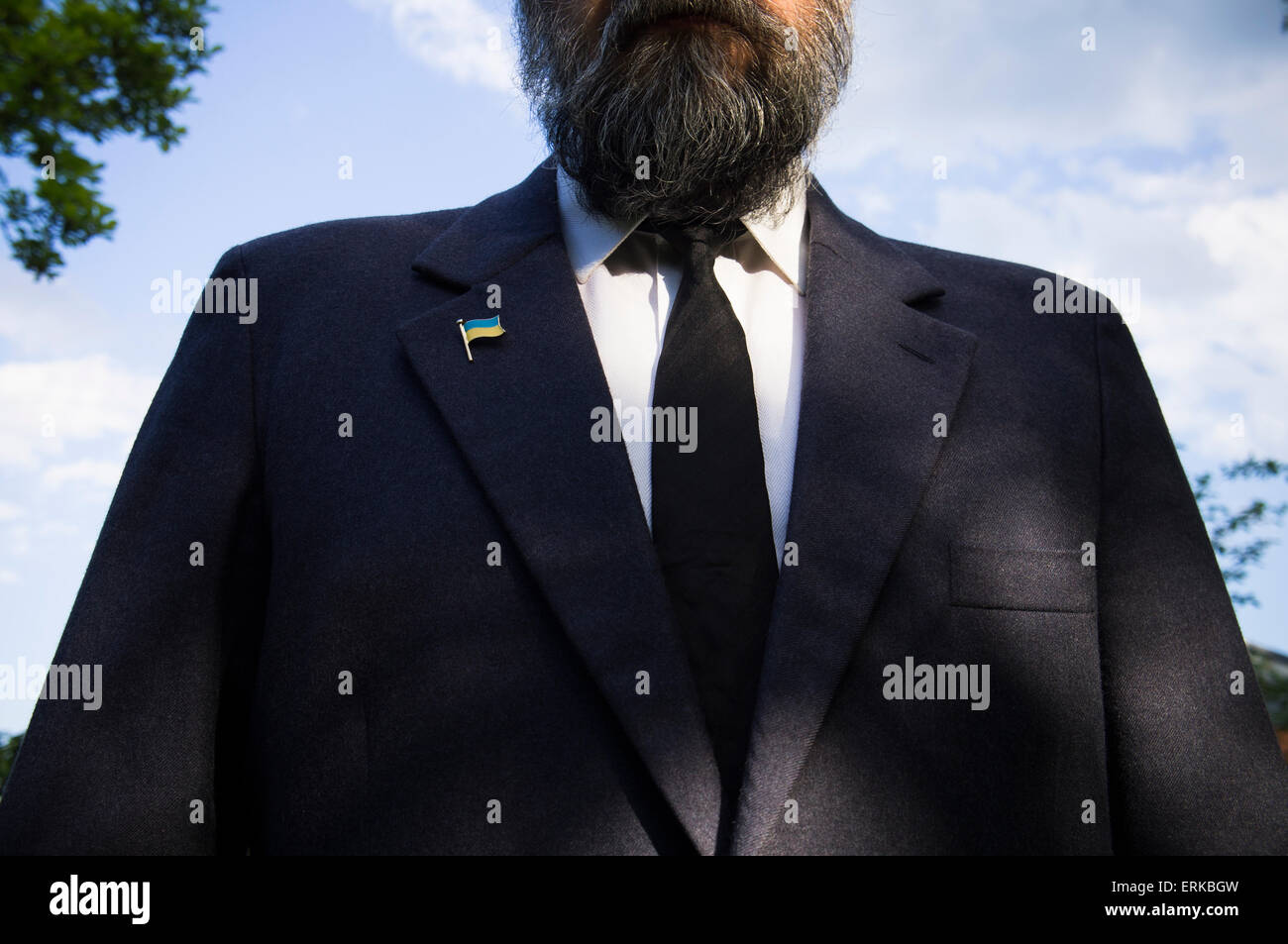 bearded man, beard, pepper-and-salt colour, jacket, Ukrainian flag ...