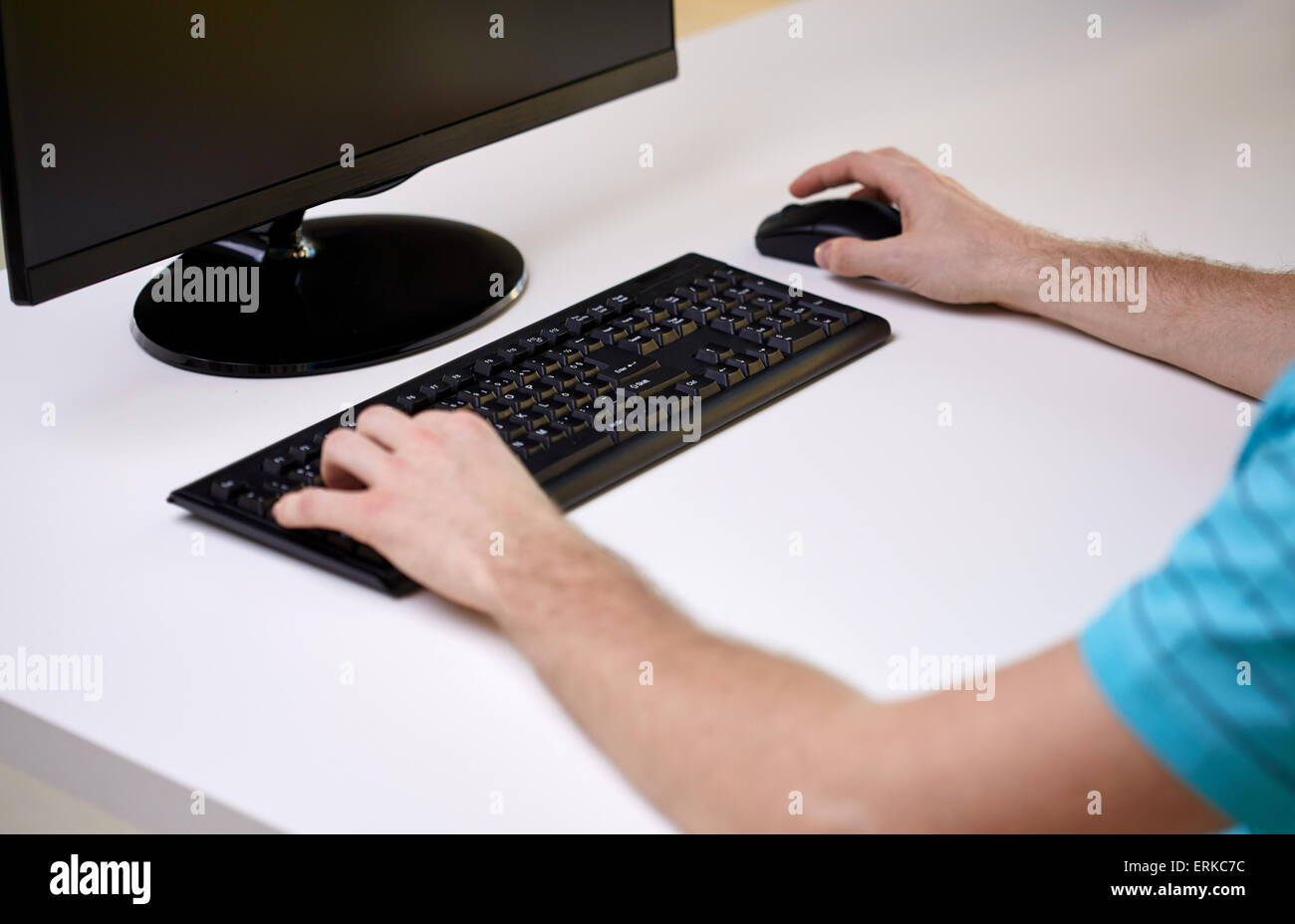 close up of male hands with computer and keyboard Stock Photo - Alamy