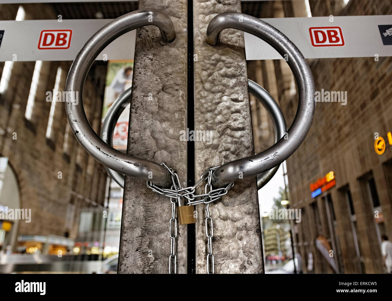 Door locked with chain and padlock, south exit of the Stuttgart central ...