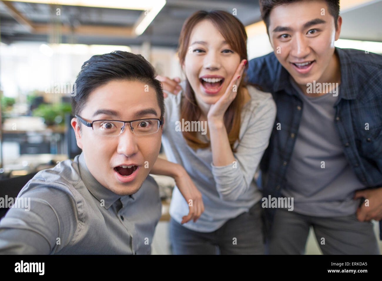 Business people looking at camera Stock Photo - Alamy