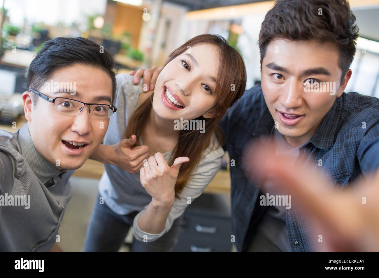 Business people looking at camera Stock Photo - Alamy