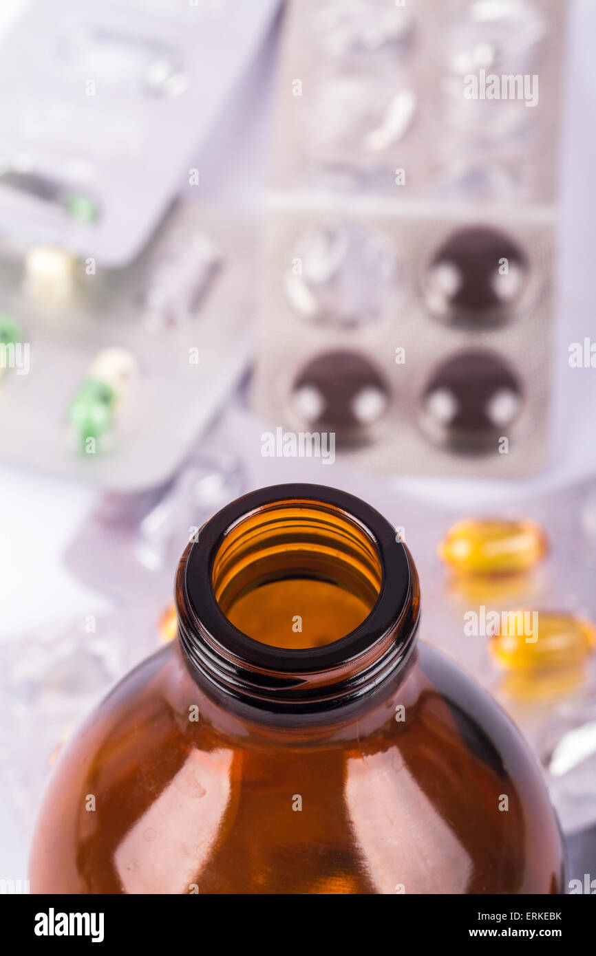 Close-up empty brown medical / pill bottle with top view, isolated on ...