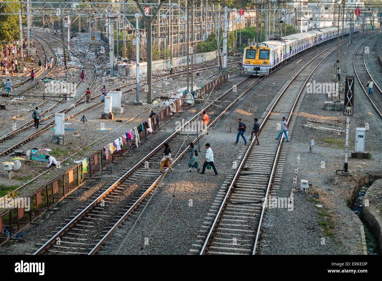 People crossing rail tracks in india hi-res stock photography and ...
