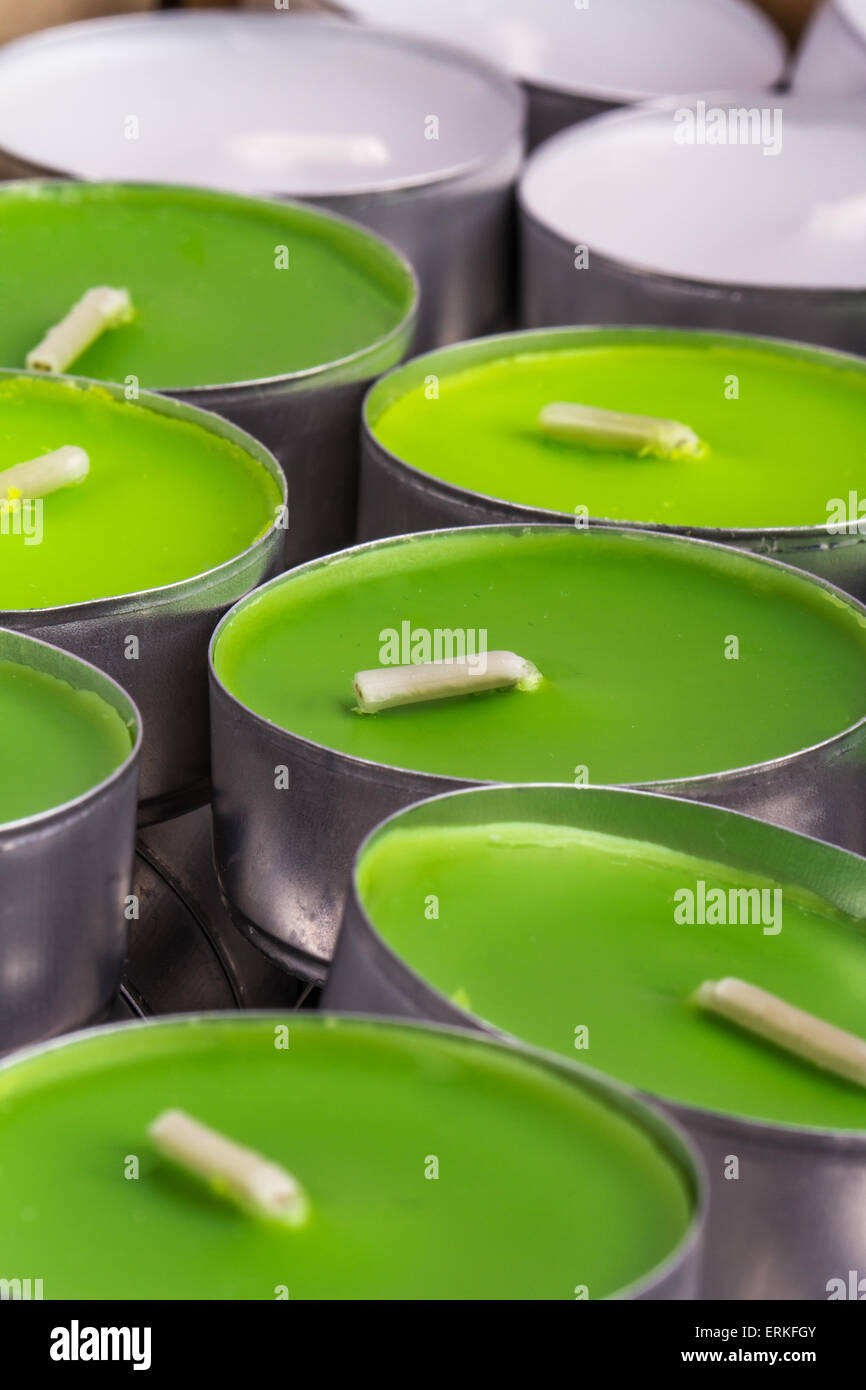 Close up detailed front view of green candles Stock Photo - Alamy