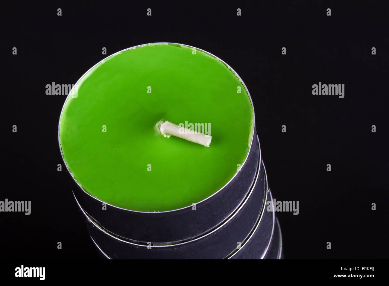Close up detailed top view of green candles, on black background Stock ...
