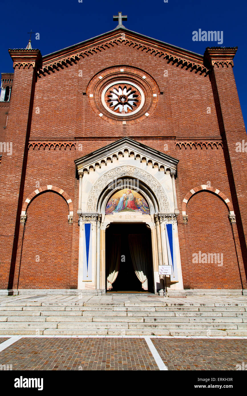 lombardy in the castellanza old church closed brick tower sidewalk ...