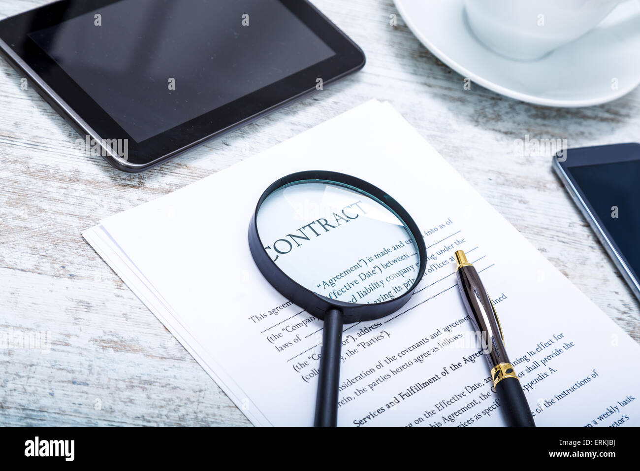 Reading a Contract before signing Stock Photo - Alamy