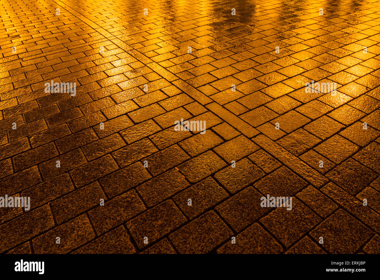 A wet cobblestone pavement in Berlin, Germany Stock Photo - Alamy