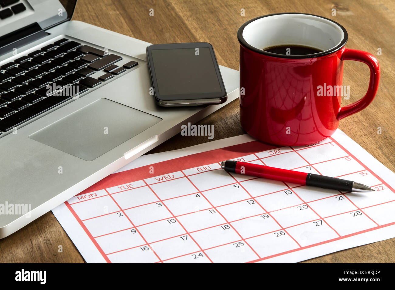 Working with the laptop and organizing monthly activities and ...