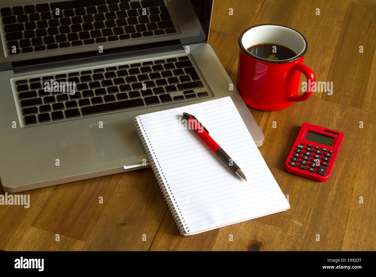 Working, taking notes and doing calculations Stock Photo - Alamy