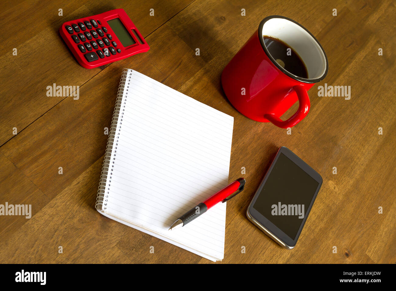 Working, taking notes and doing calculations Stock Photo - Alamy