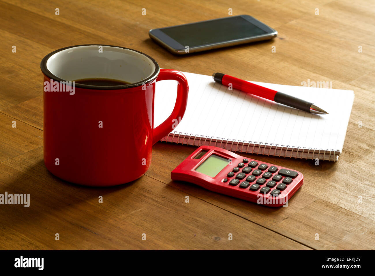 Working, taking notes and doing calculations Stock Photo - Alamy
