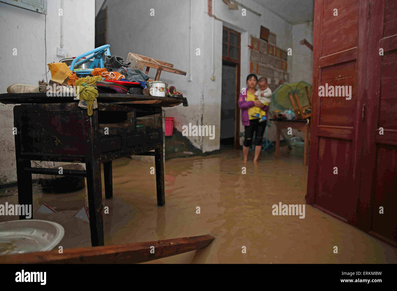 Nanchang. 4th June, 2015. Flood is seen in a resident's house in ...