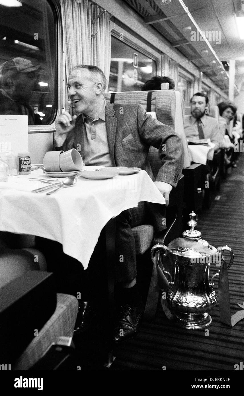 Liverpool manager Bill Shankly with the FA Cup trophy on board the ...