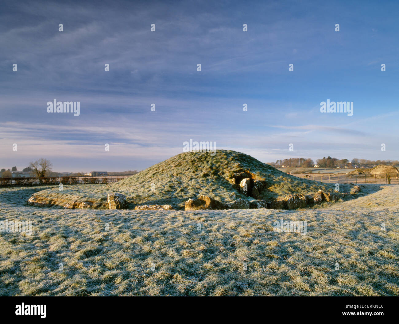 Entrance, retaining kerb & partly reconstructed round barrow of Bryn ...