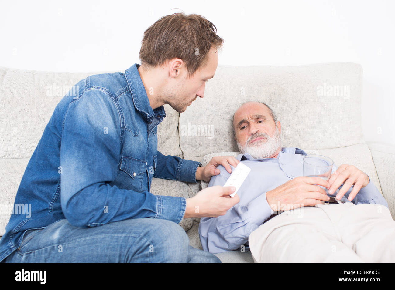 Father taking care ill hi-res stock photography and images - Alamy