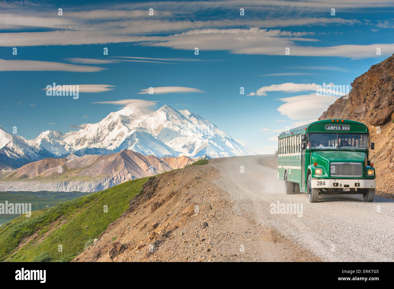 Scenic view of Mt. McKinley with a tour bus on the Park Road in the ...