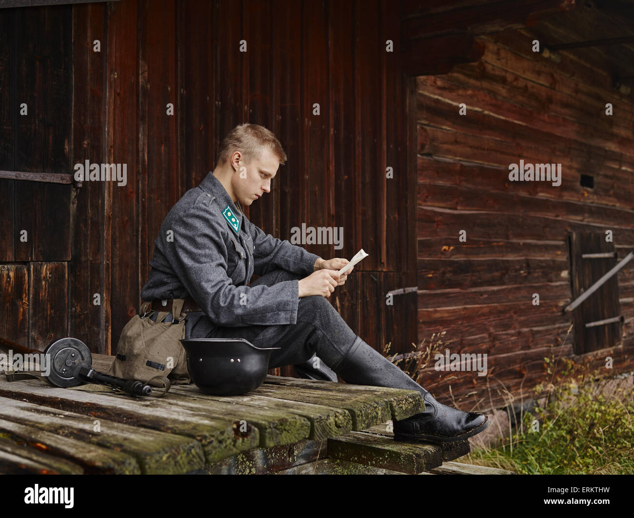 Historic costume theme World War II, Finnish soldier and Submachine-gun ...