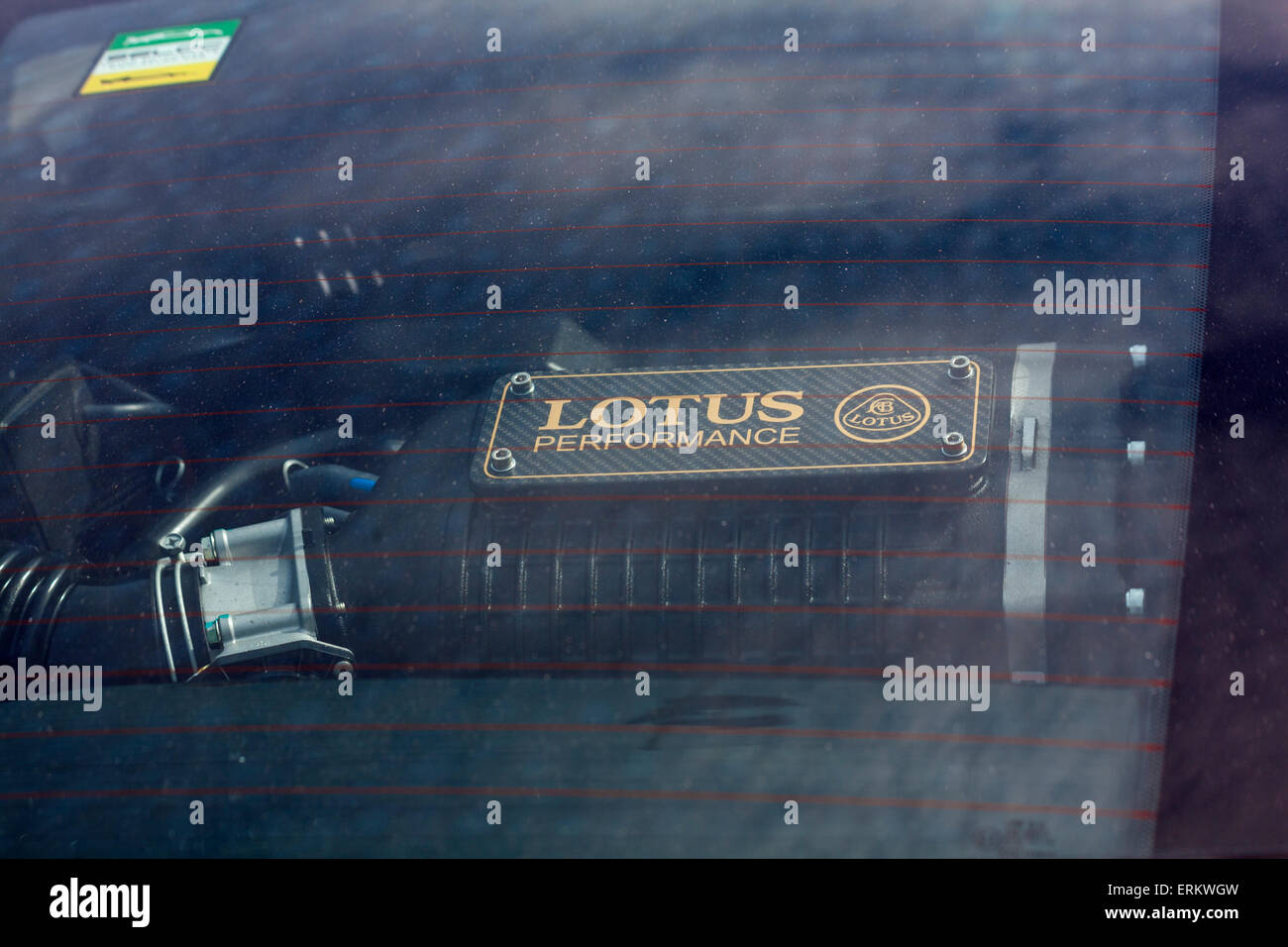 Lotus Performance engine in Sports Car with name badge Stock Photo - Alamy