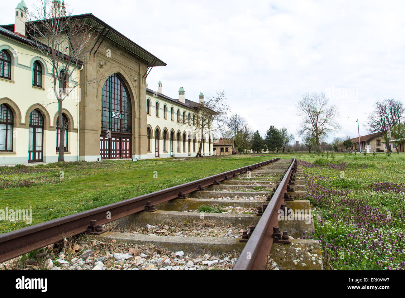 Long train rails with pebbles Stock Photo - Alamy