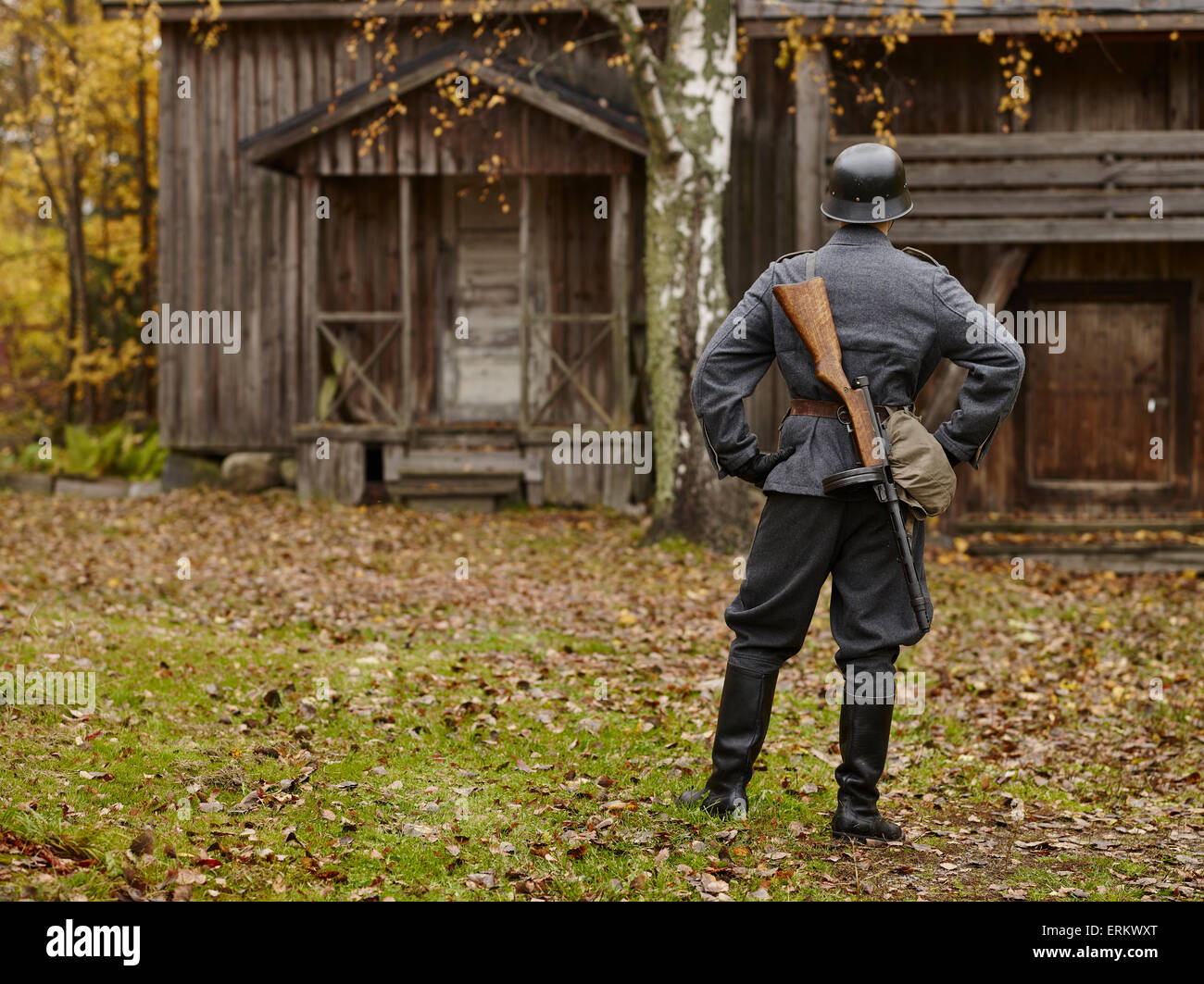 Historic costume theme World War II, Finnish soldier and Submachine-gun ...