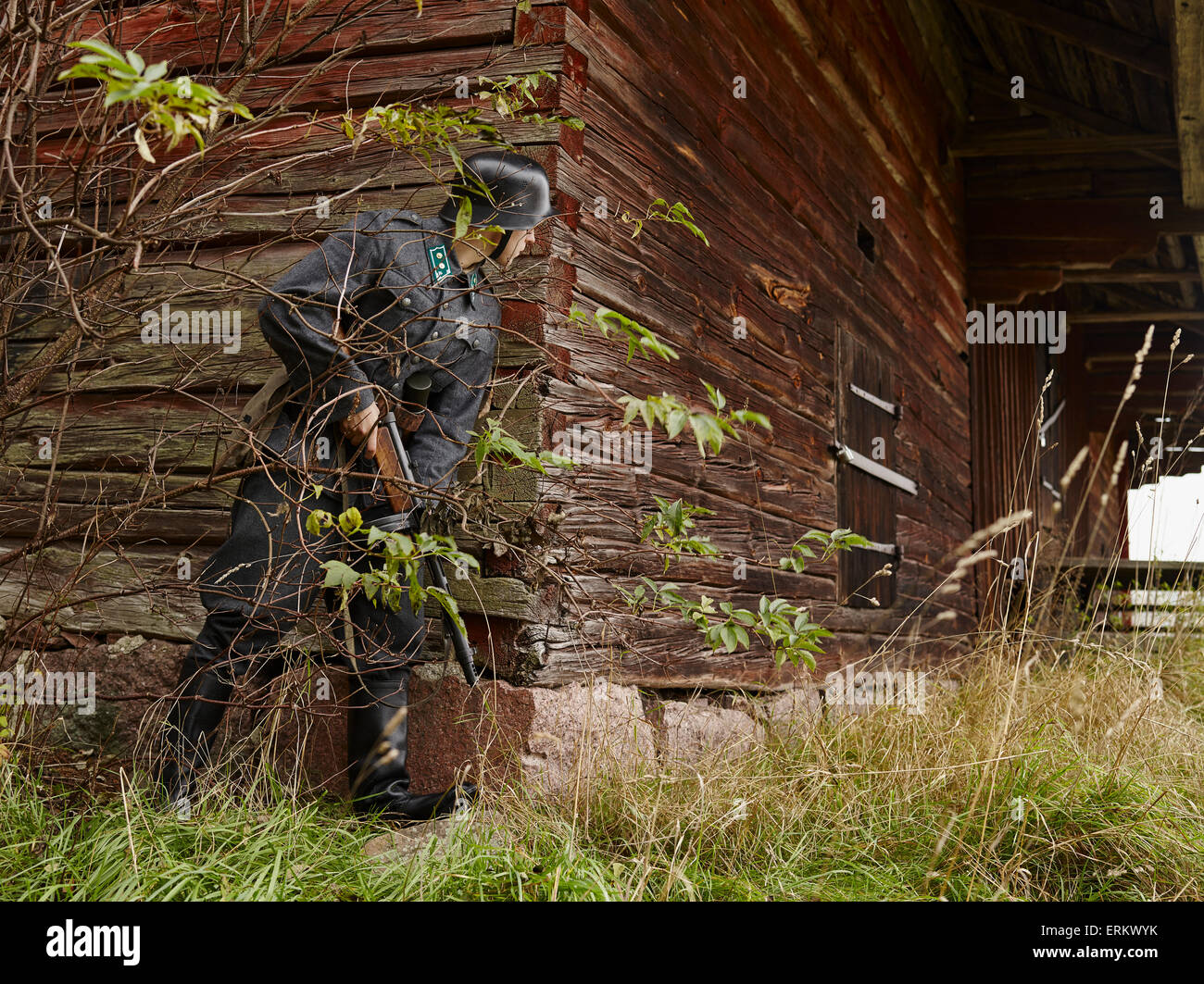 Historic costume theme World War II, Finnish soldier uses Submachine ...