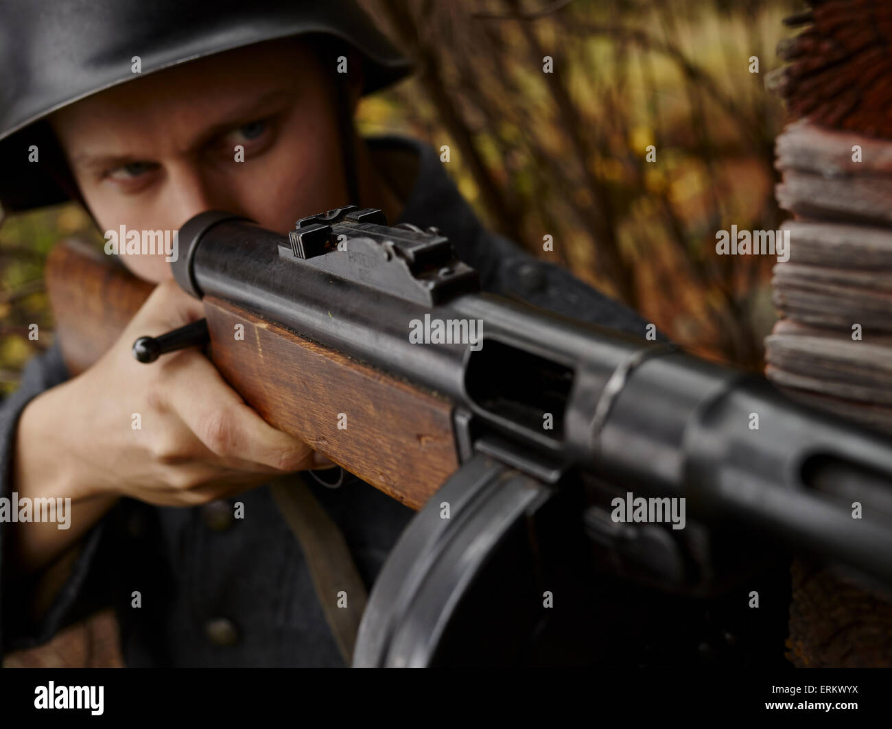 Historic costume theme World War II, Finnish soldier uses Submachine ...