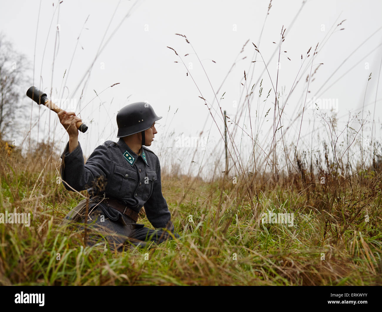 Historic costume theme World War II, Finnish soldier uses the hand ...