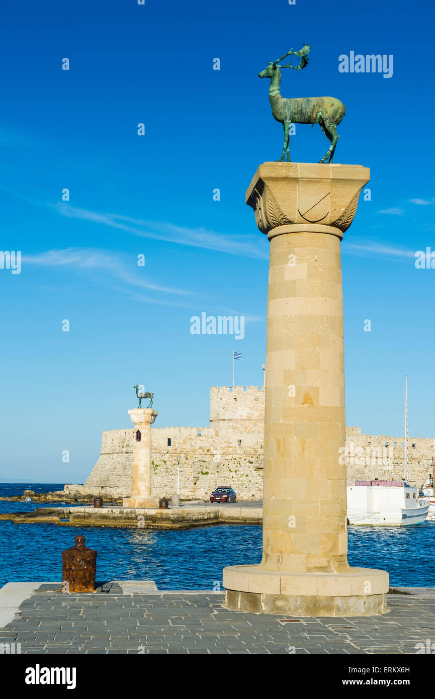 The entrance to Mandraki harbour, the Medieval Old Town of the City of ...