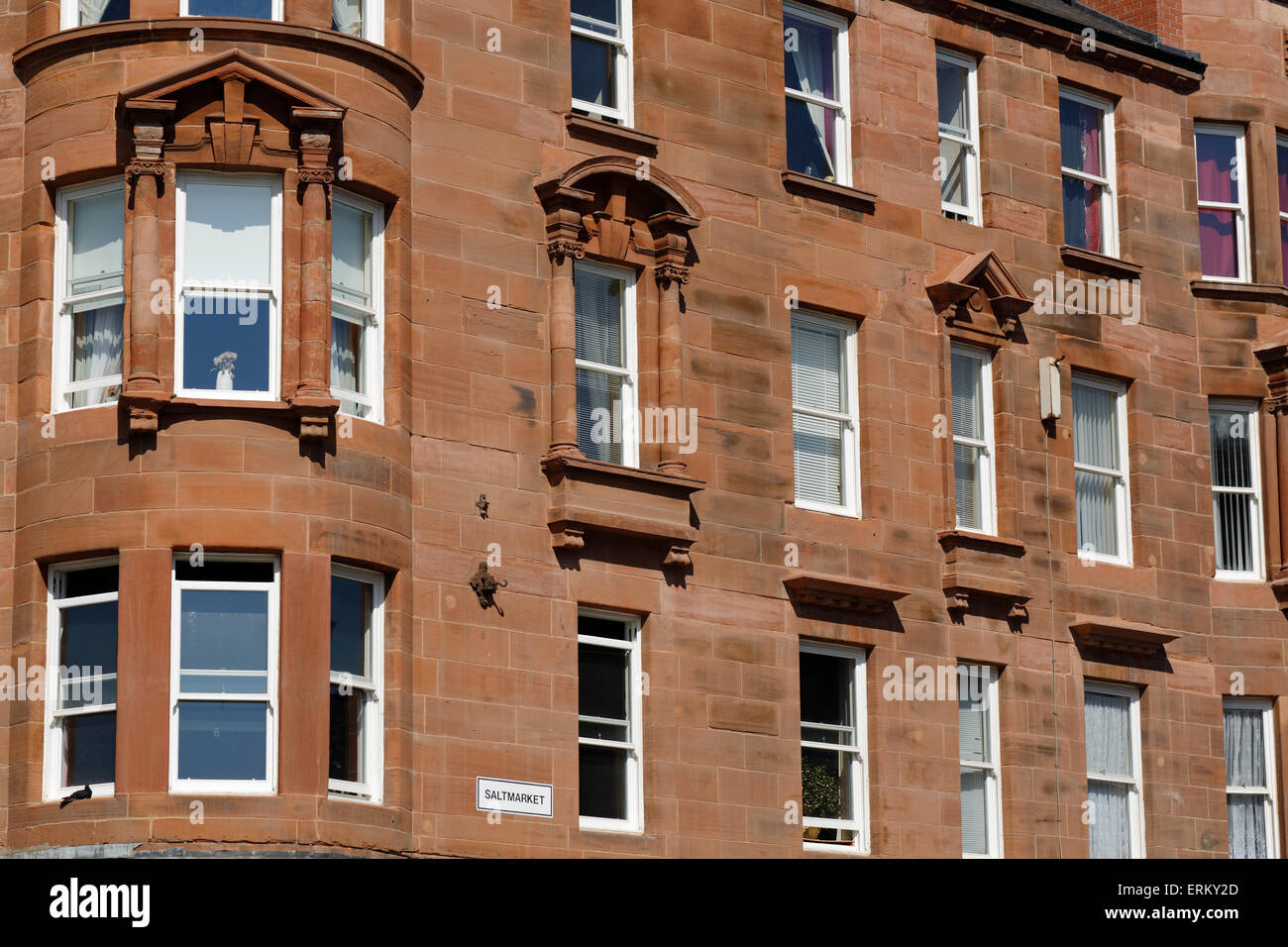 Detail of a red sandstone tenement on Saltmarket in the Merchant City ...