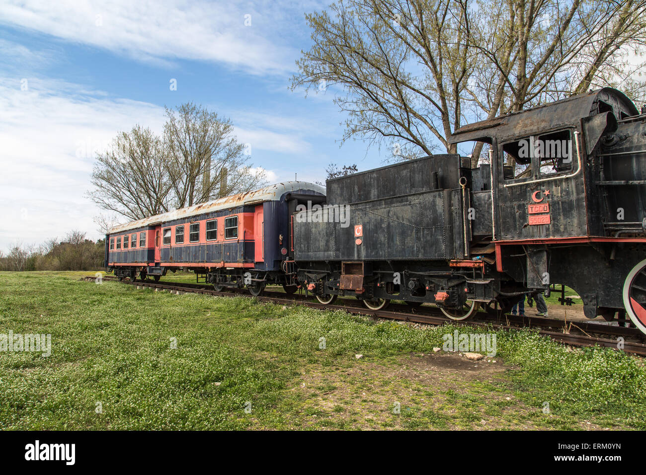 Side view of black old train wagon, in cloudy sky Stock Photo - Alamy