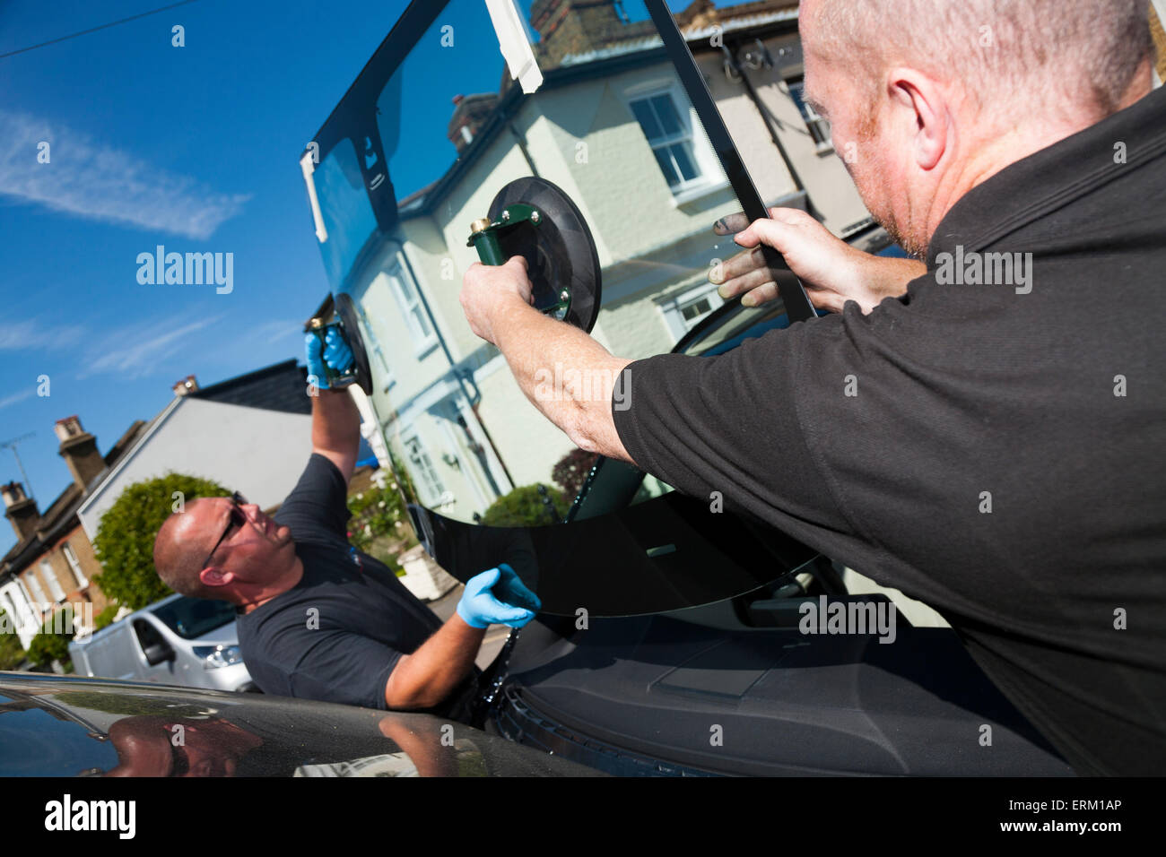 Windscreen fitter from Screen-Tec Windscreens fitting a replacement ...