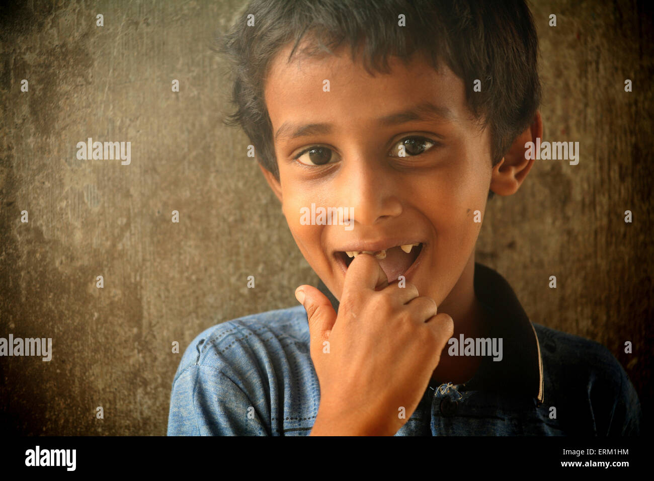 Finger at the mouth High Resolution Stock Photography and Images - Alamy