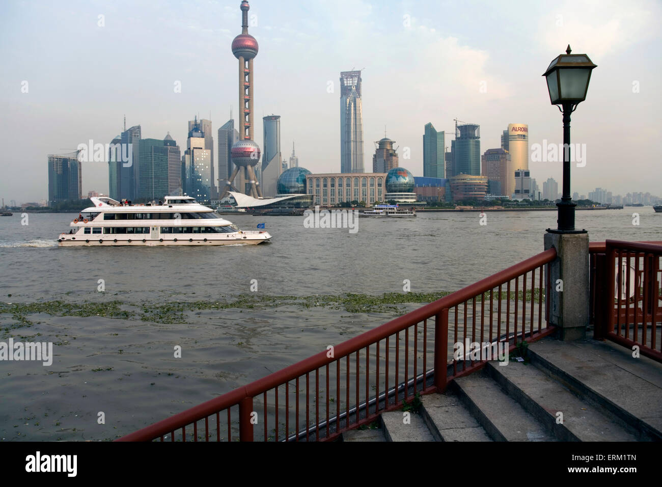 Shanghai skyline and boat Stock Photo - Alamy