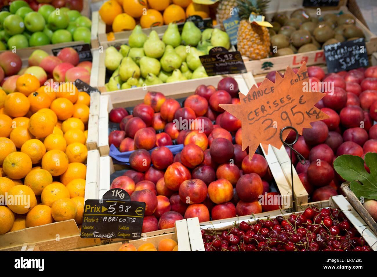 A packed fruit market stall, with fresh fruit on display Stock Photo ...