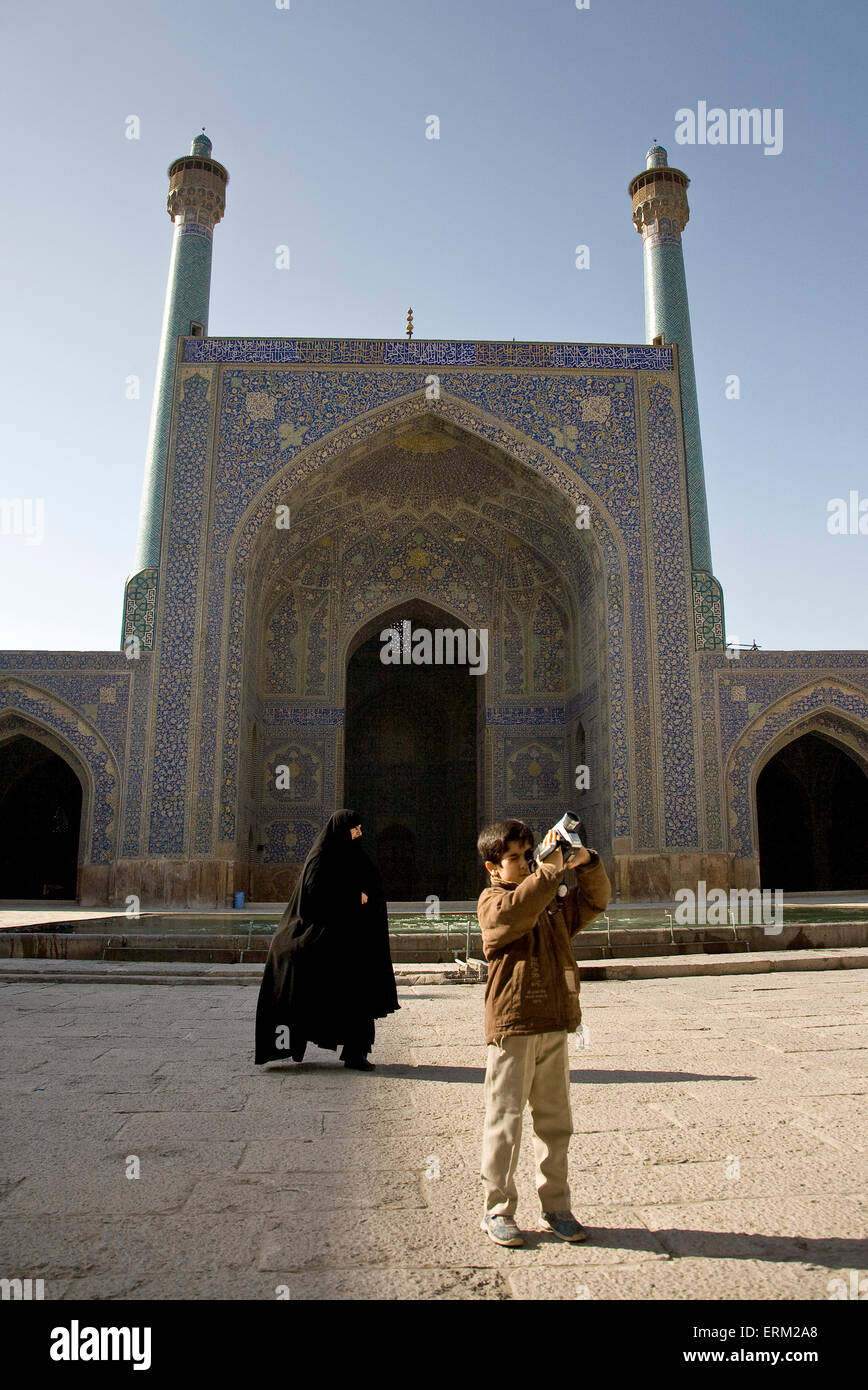 Young Iranian tourist filming in Imam mosque in Esfahan, Iran Stock ...