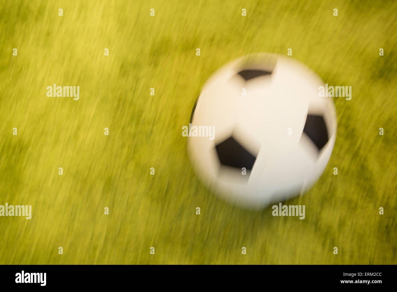 moving football on grass Stock Photo - Alamy