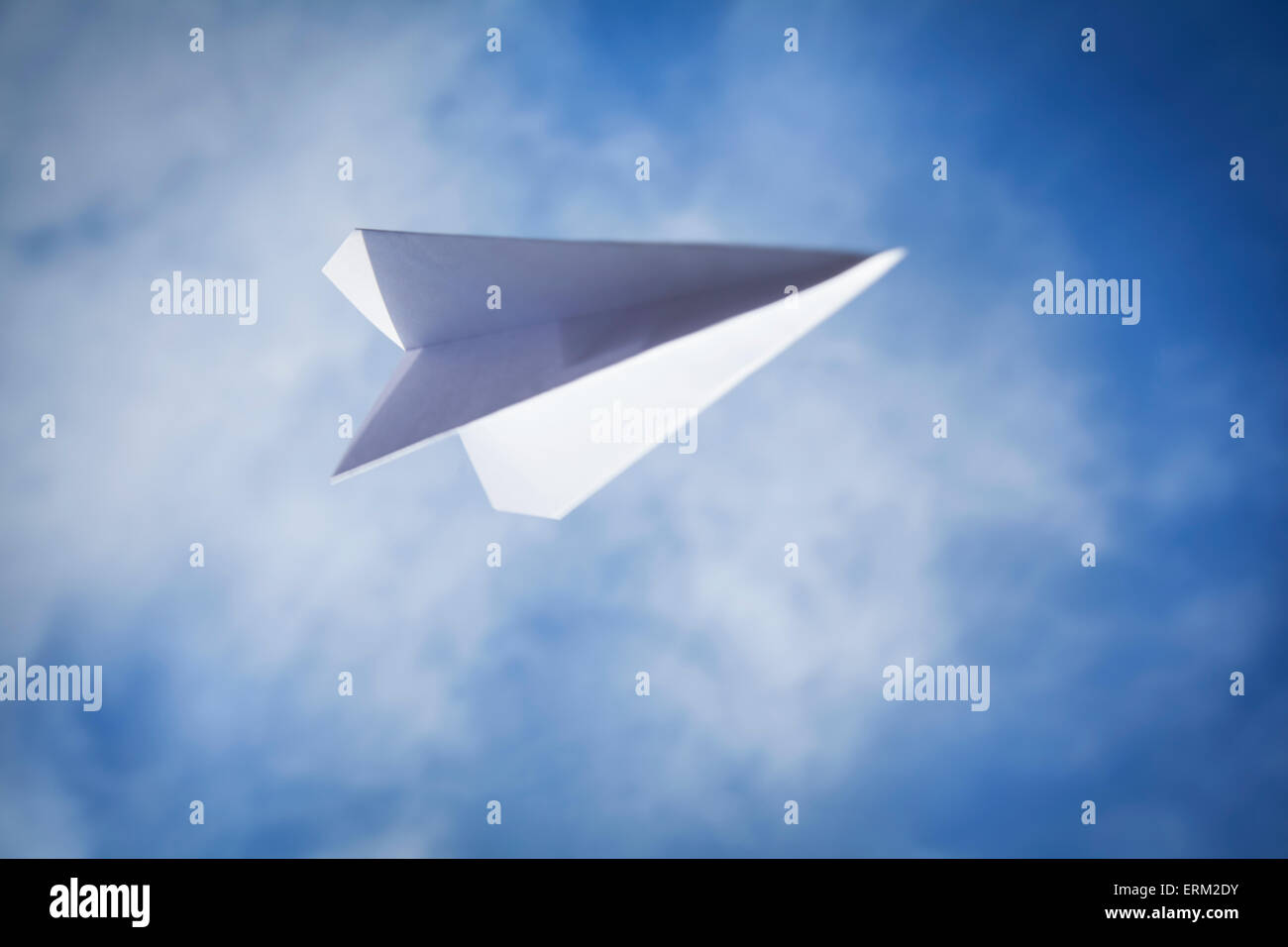 paper aeroplane in flight Stock Photo - Alamy