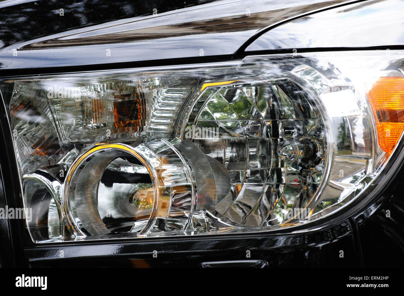 black automobile headlight as background Stock Photo - Alamy