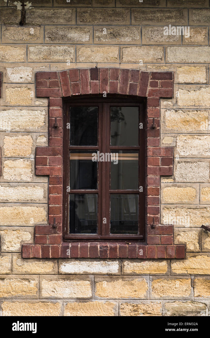 Front view of old window of stone building Stock Photo - Alamy