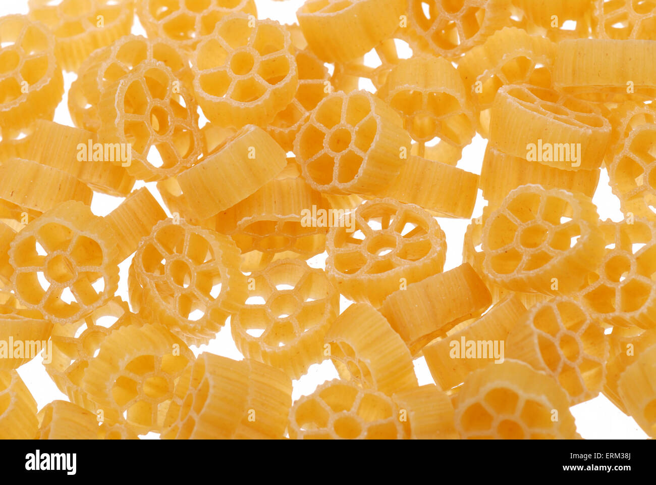 Raw pasta isolated on white Stock Photo - Alamy
