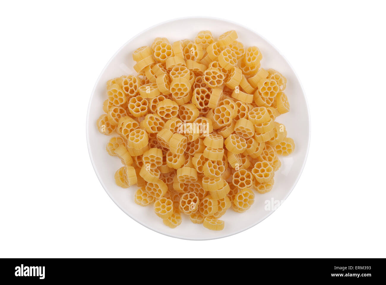 Pasta in a plate on white Stock Photo - Alamy