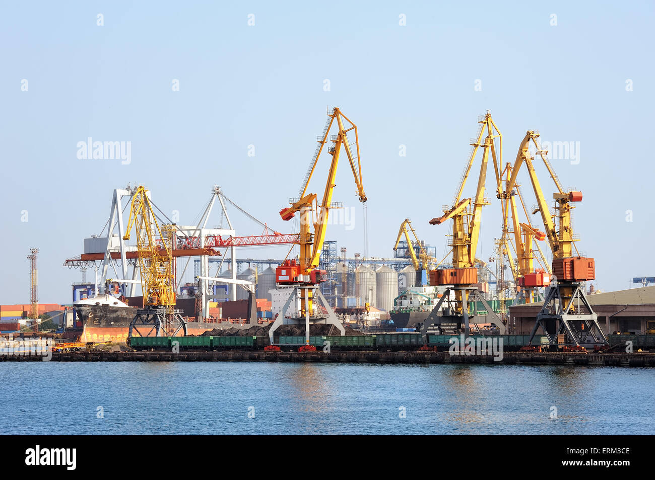 Port warehouse with containers and industrial cargoes Stock Photo - Alamy